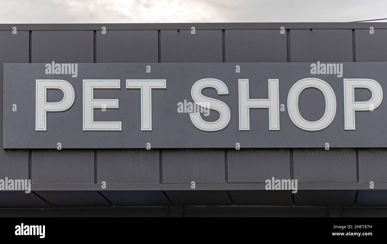 Big Sign Pet Shop at Black Commercial Building Stock Photo - Alamy