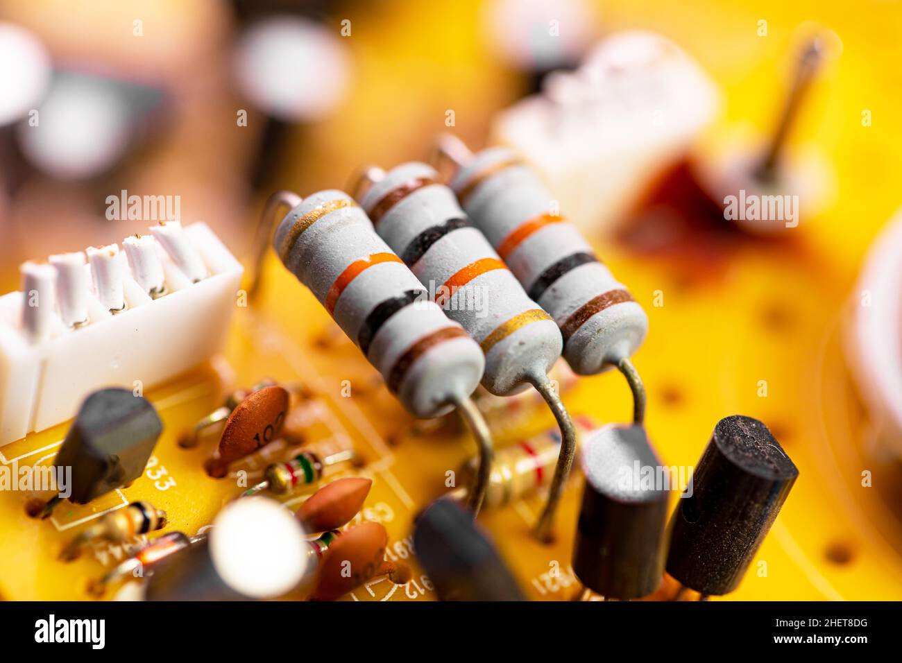 Macro Close up of components and microchips on old PC circuit board ...