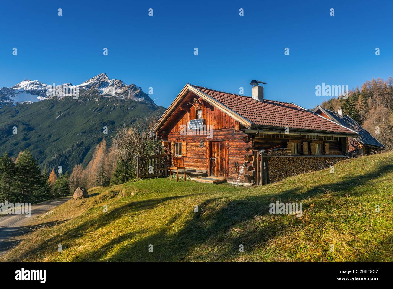 old wooden hut cabin in mountain alps at rural fall landscape Stock ...