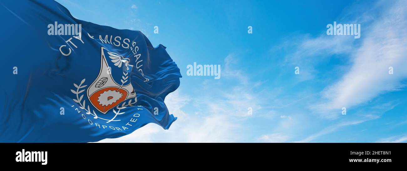 flag of Mississauga , Canada at cloudy sky background on sunset ...