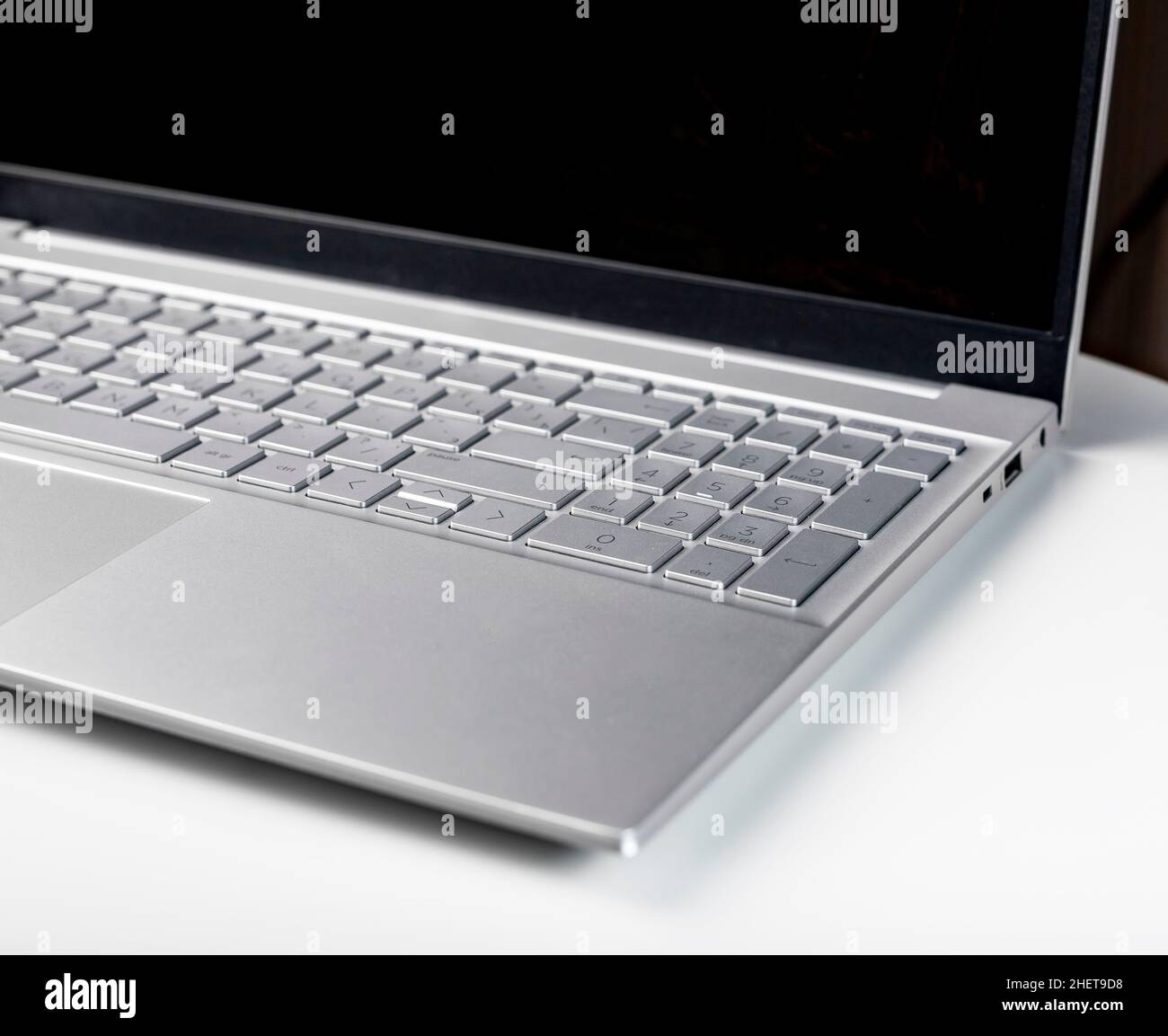 Laptop keyboard and screen closeup. Silver keypad details Stock Photo ...