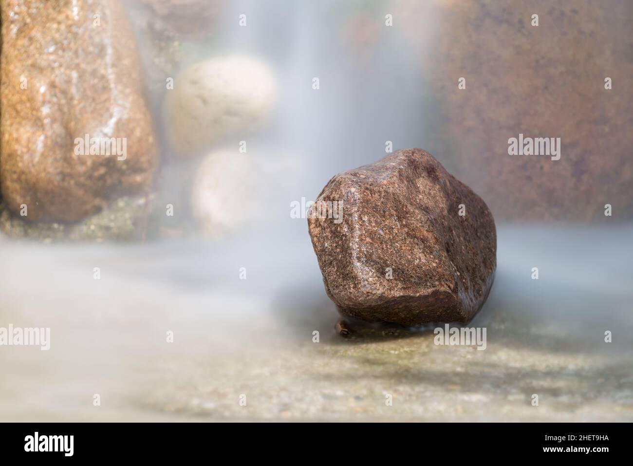 small granite rock stone flooded of water Stock Photo - Alamy