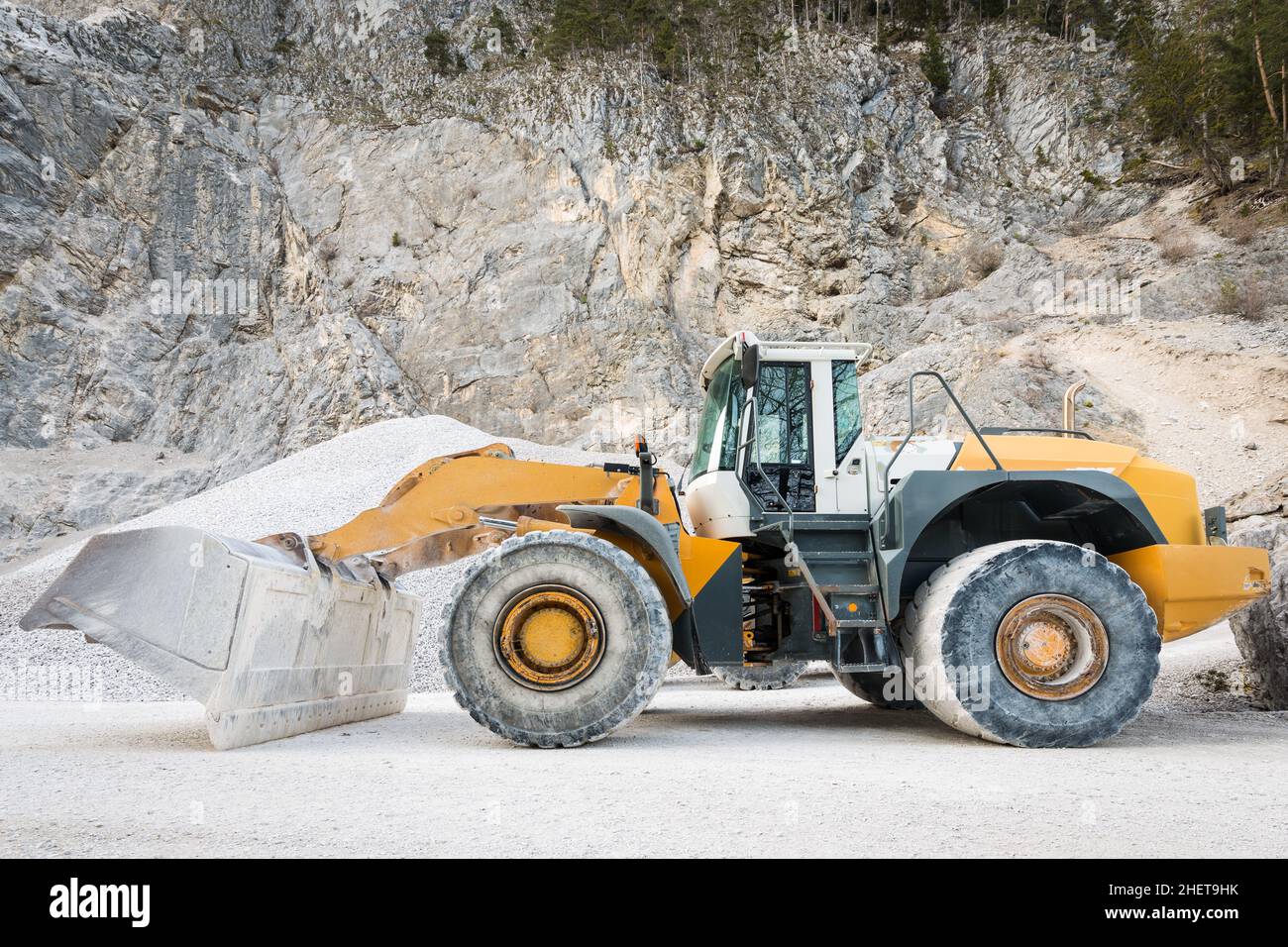 side view of large and heavy wheel mounted front loader at mine Stock ...