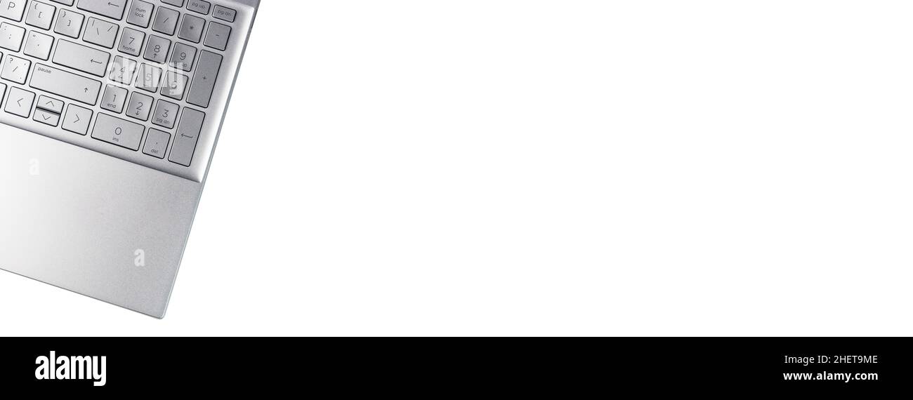 Laptop keyboard close up, top view. Banner with silver keypad on white ...