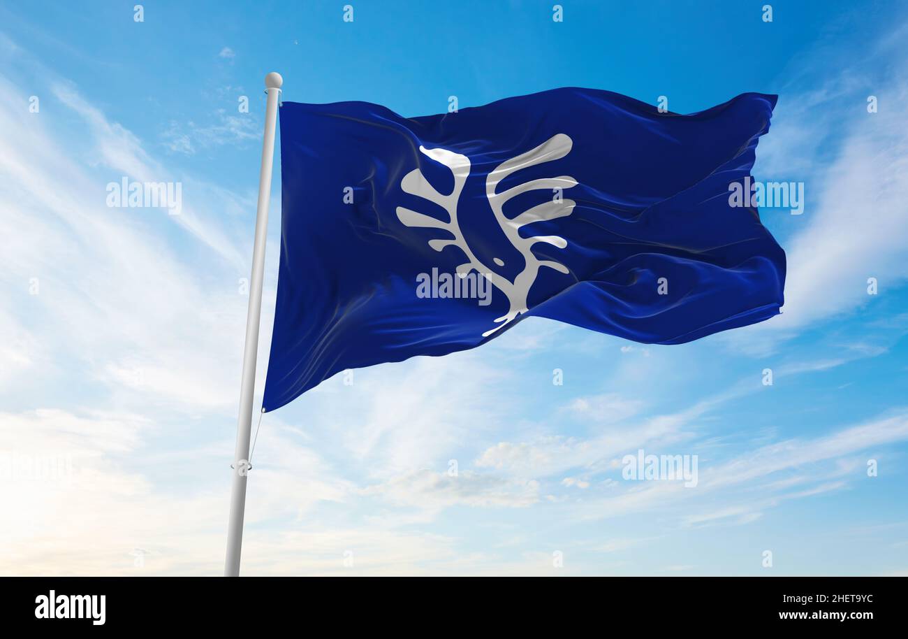 flag of Nunavik Thomassie Mangiok , Canada at cloudy sky background on ...