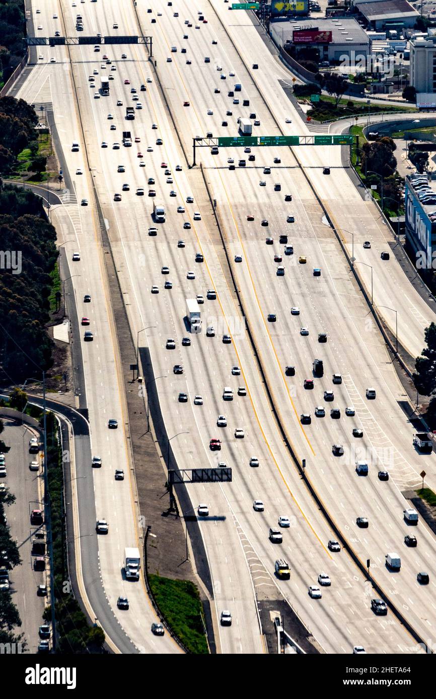 aerial view to Los Angeles with cars on freeway driving downtown Stock ...