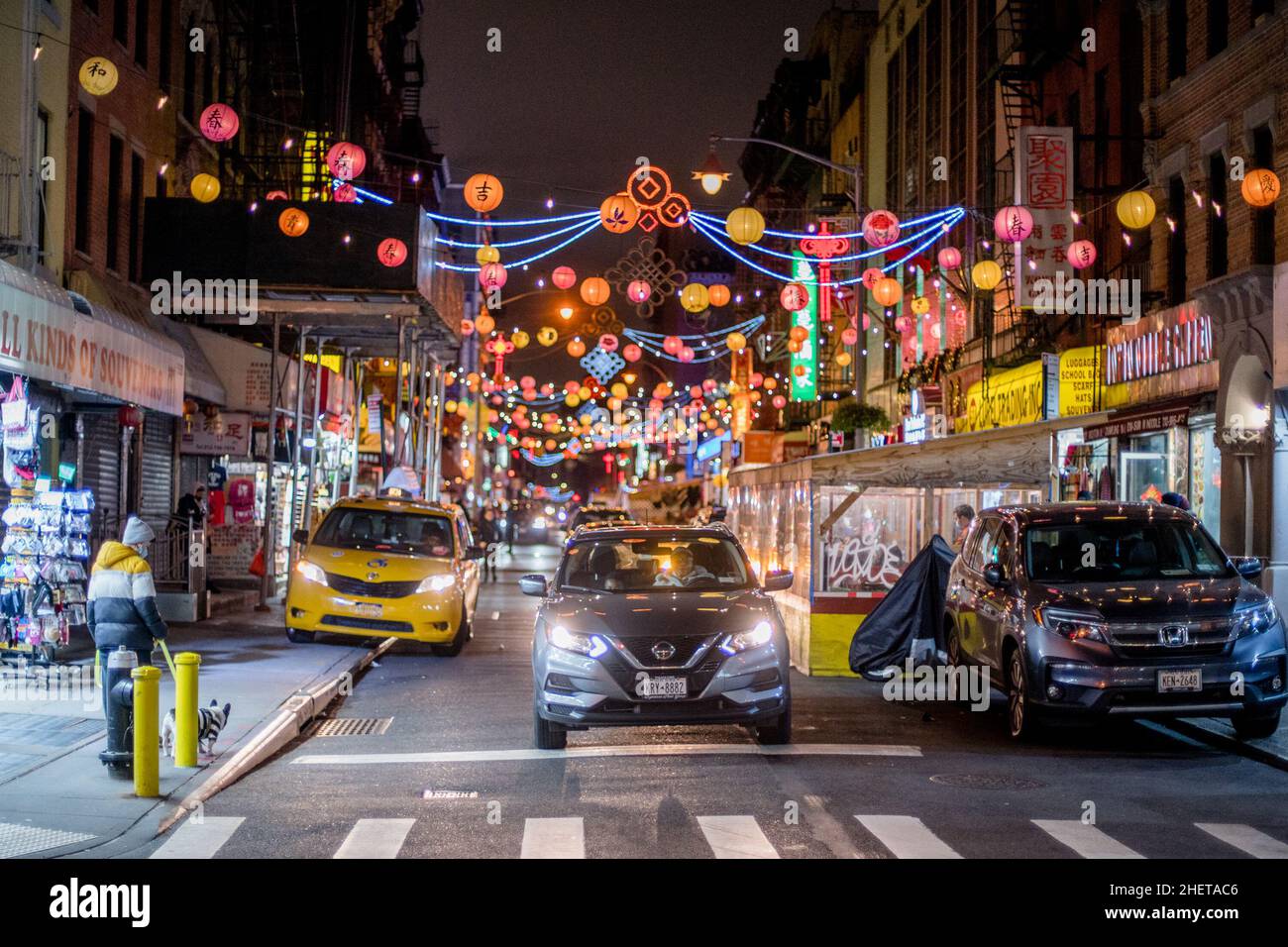 View of Mott street in Chinatown in lower Manhattan at street level ...