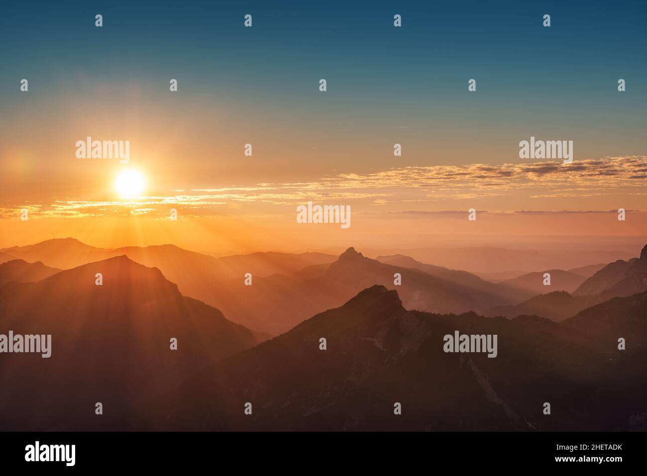 colorful sunset on top of austrian mountain alps Stock Photo - Alamy
