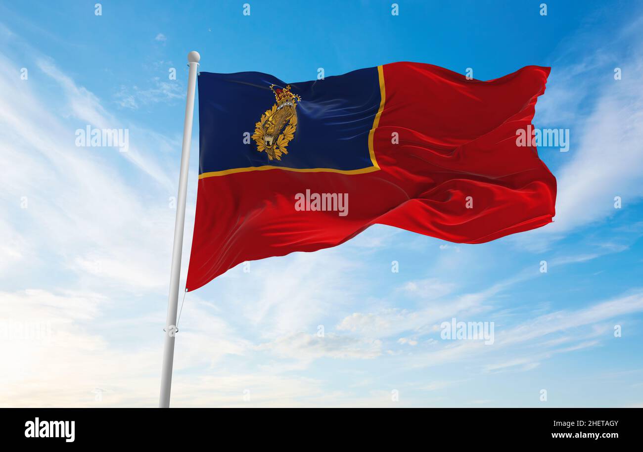 flag of Royal Canadian Mounted Police , Canada at cloudy sky background ...