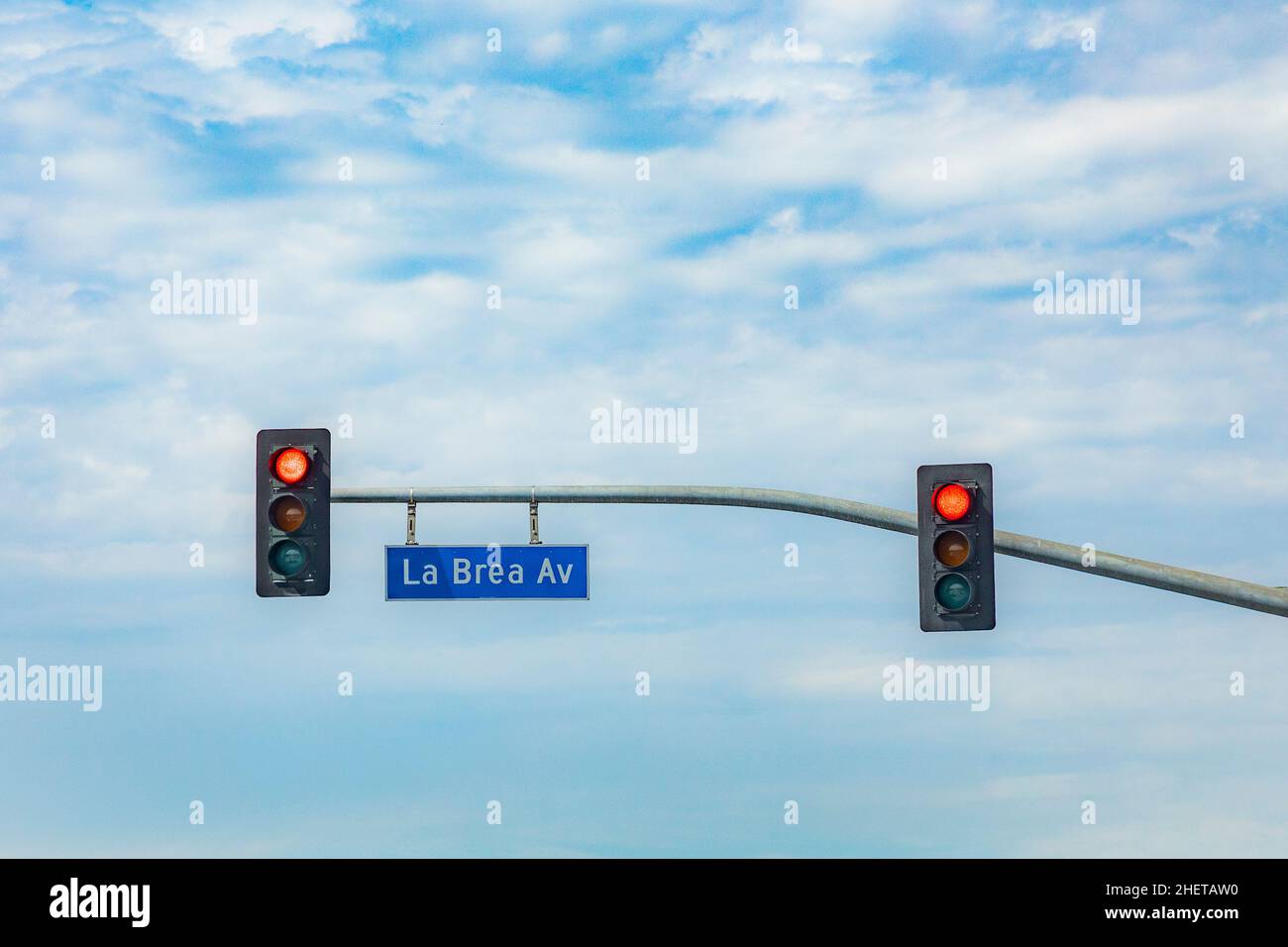 street name La Brea Avenue in Hollywood with red traffic light under ...