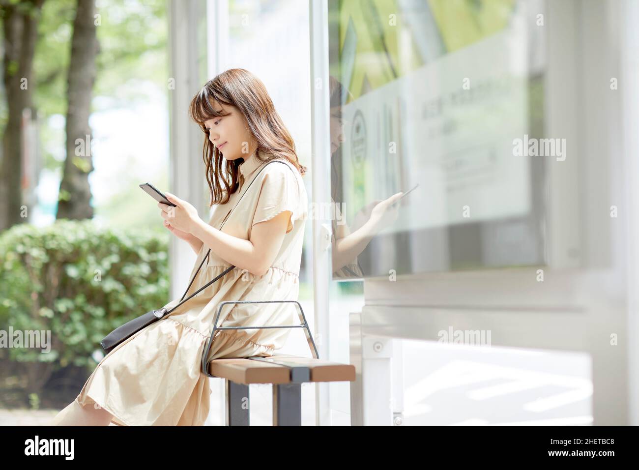 Japanese Woman Operating Smart Phone Stock Photo - Alamy