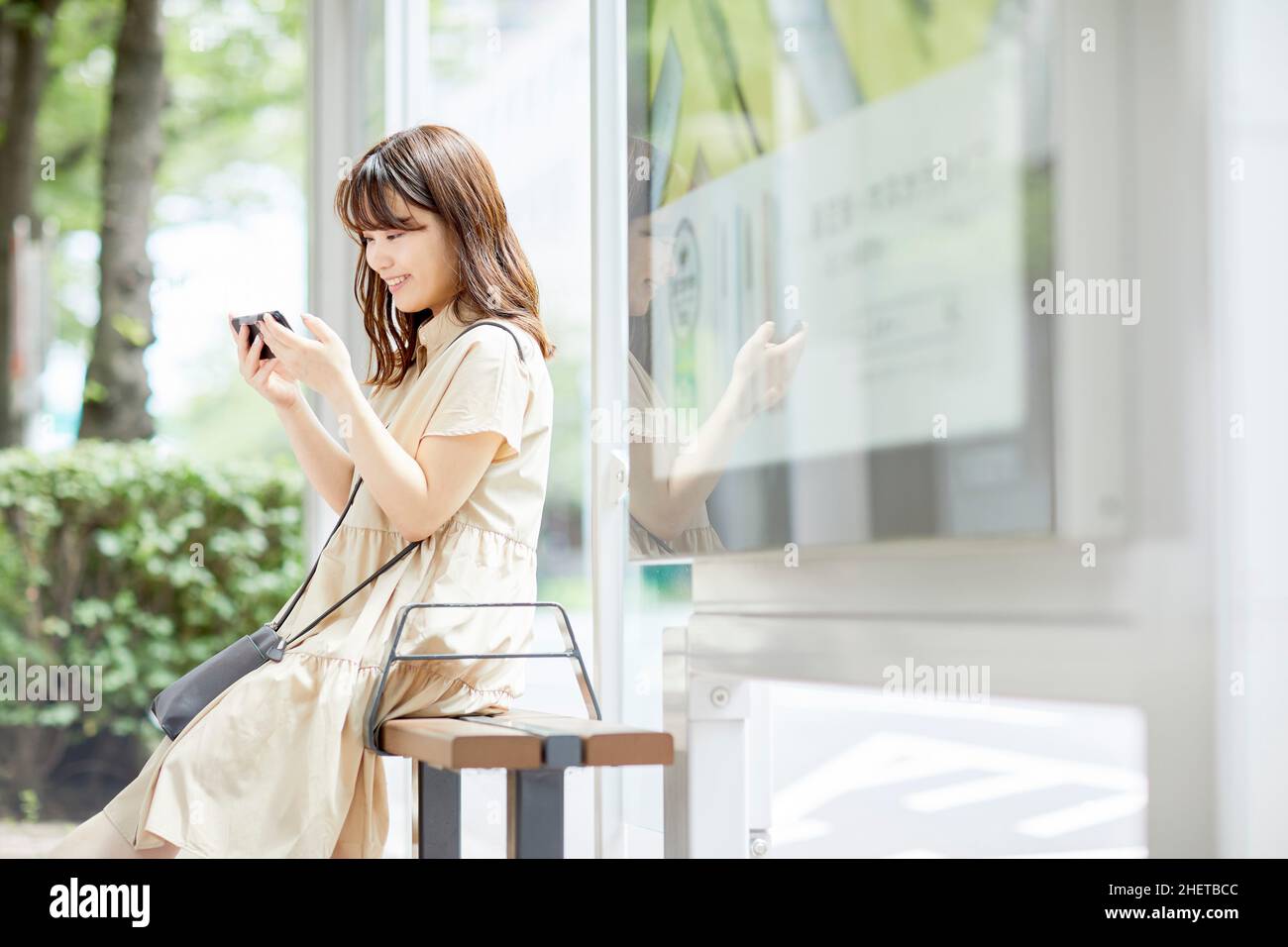 Japanese Woman Operating Smart Phone Stock Photo - Alamy