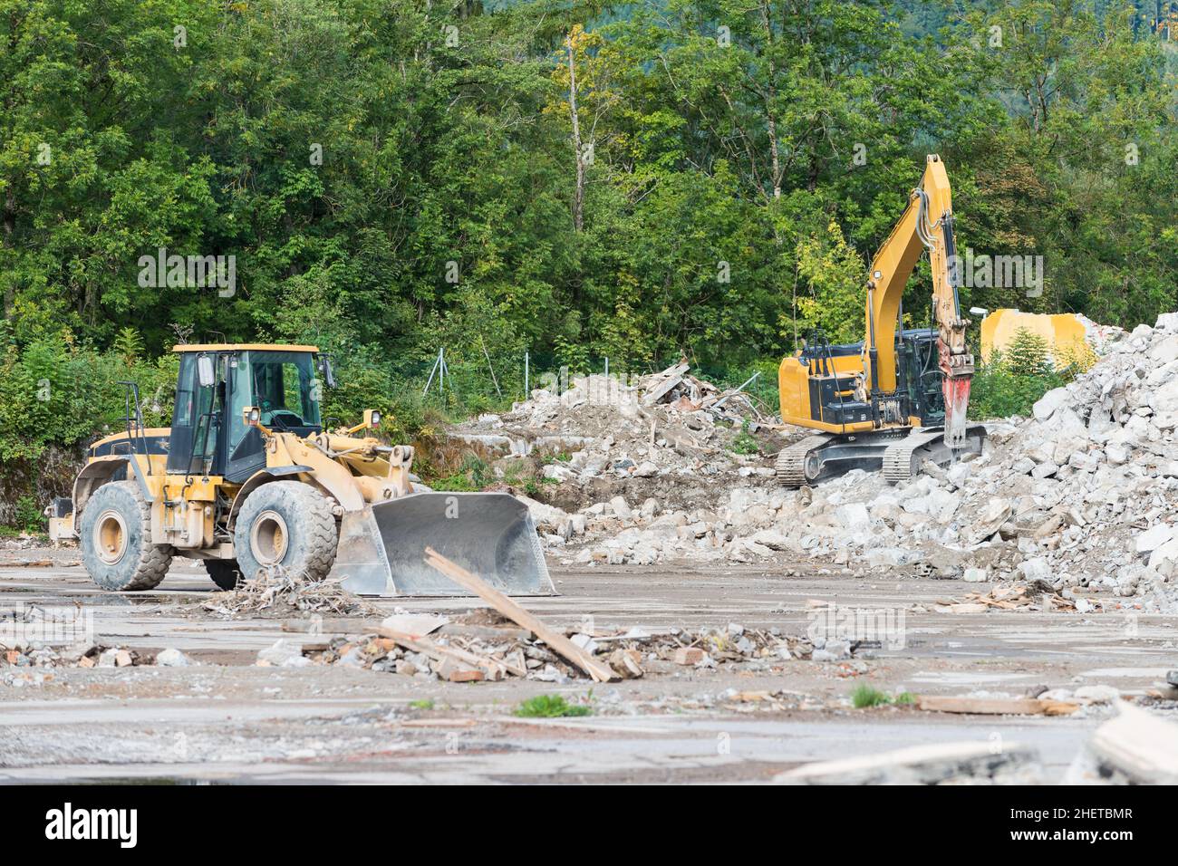 bulldozer and pneumatic jackhammer digger on demolition site Stock ...