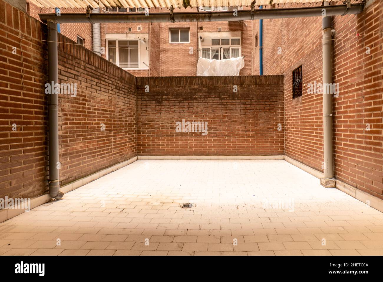 Inner courtyard on the ground floor of a residential building with ...