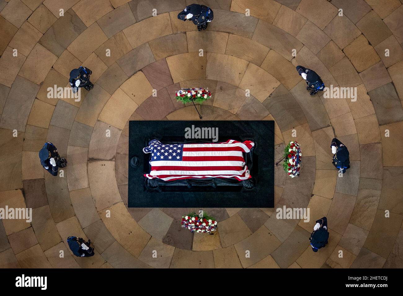 Washington. 12th Jan, 2022. Officers salute the casket of former Sen ...