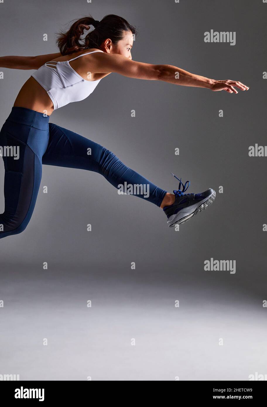 Japanese Woman Jumping Stock Photo - Alamy