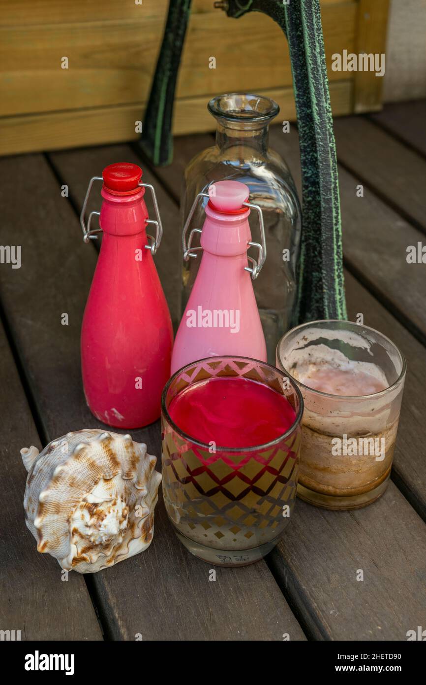 Corner of an urban terrace with wooden floors and decorative objects ...
