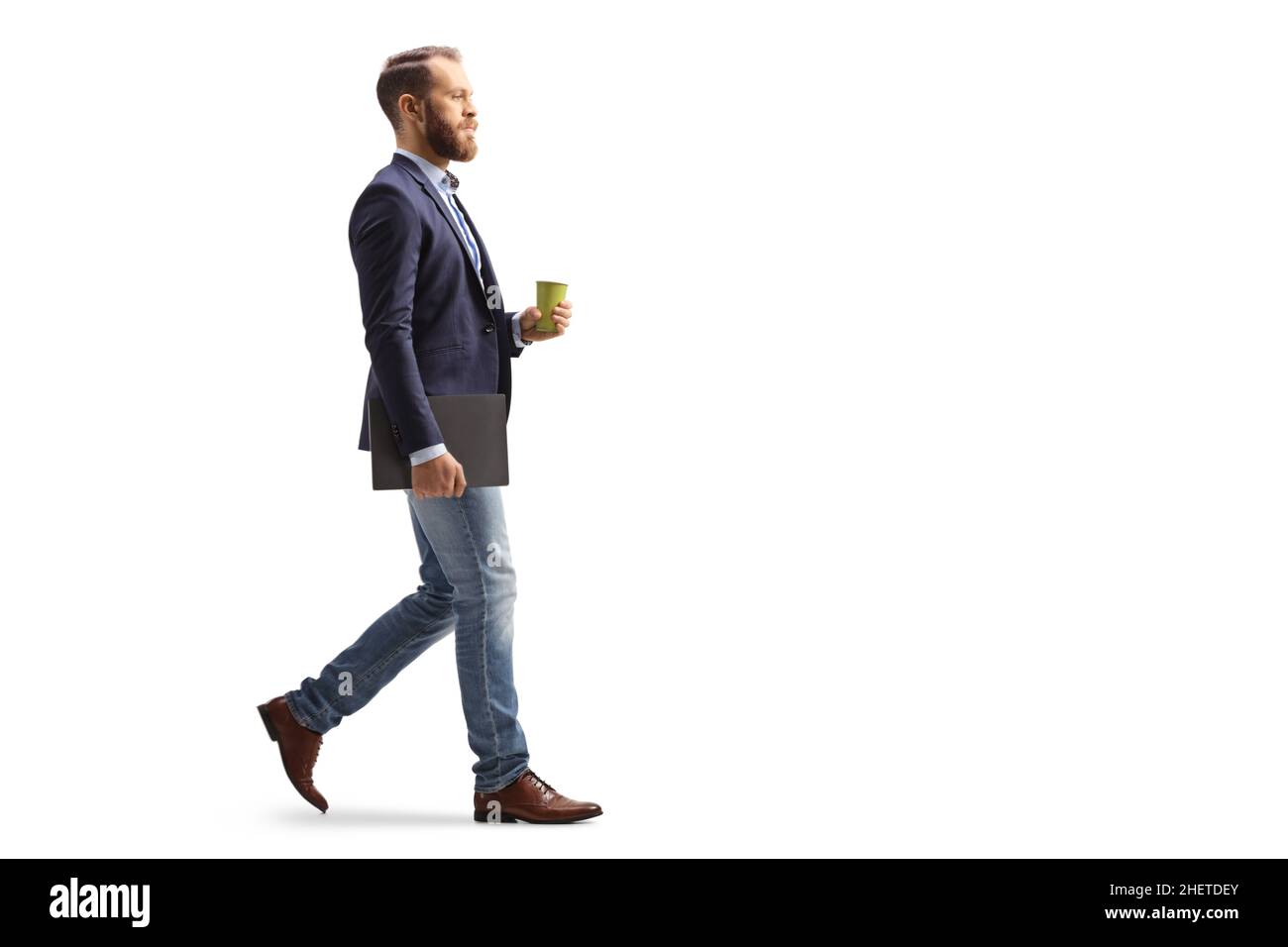 Professional man walking laptop computer hi-res stock photography and ...