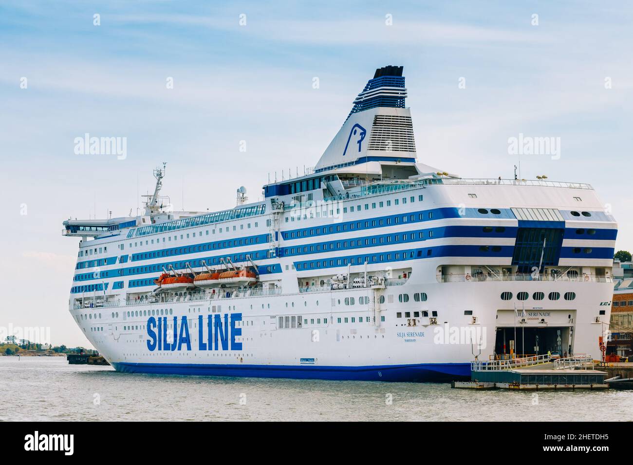 Modern ferry boat "Silja Line" at pier awaiting loading cargo from port ...