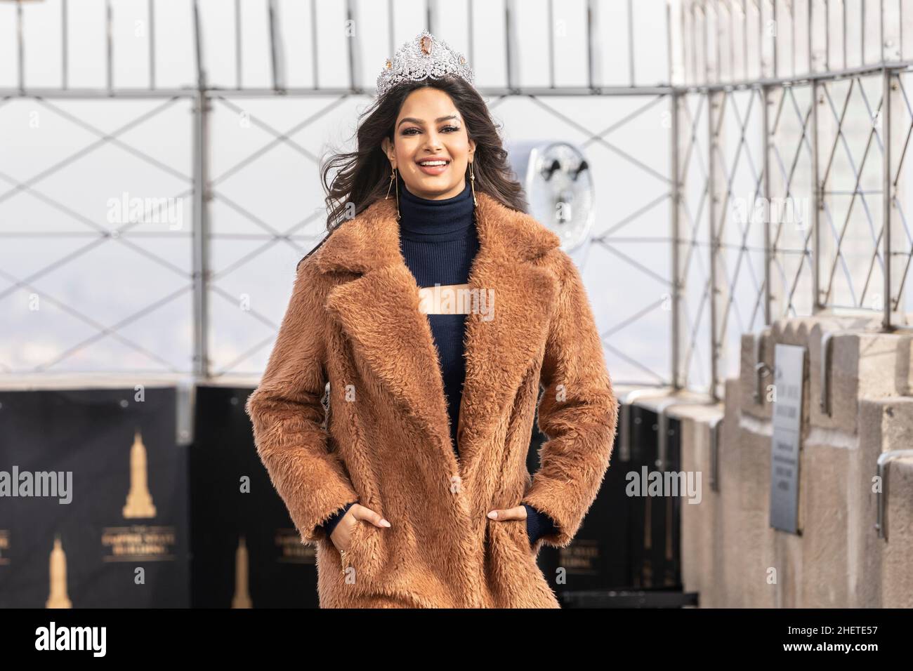 Miss Universe Harnaaz Sandhu of India wearing dress by Halston visits the Empire State Building ...