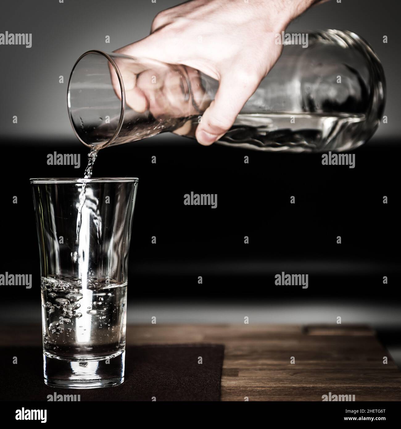 Hand filling fresh water in hi-res stock photography and images - Alamy