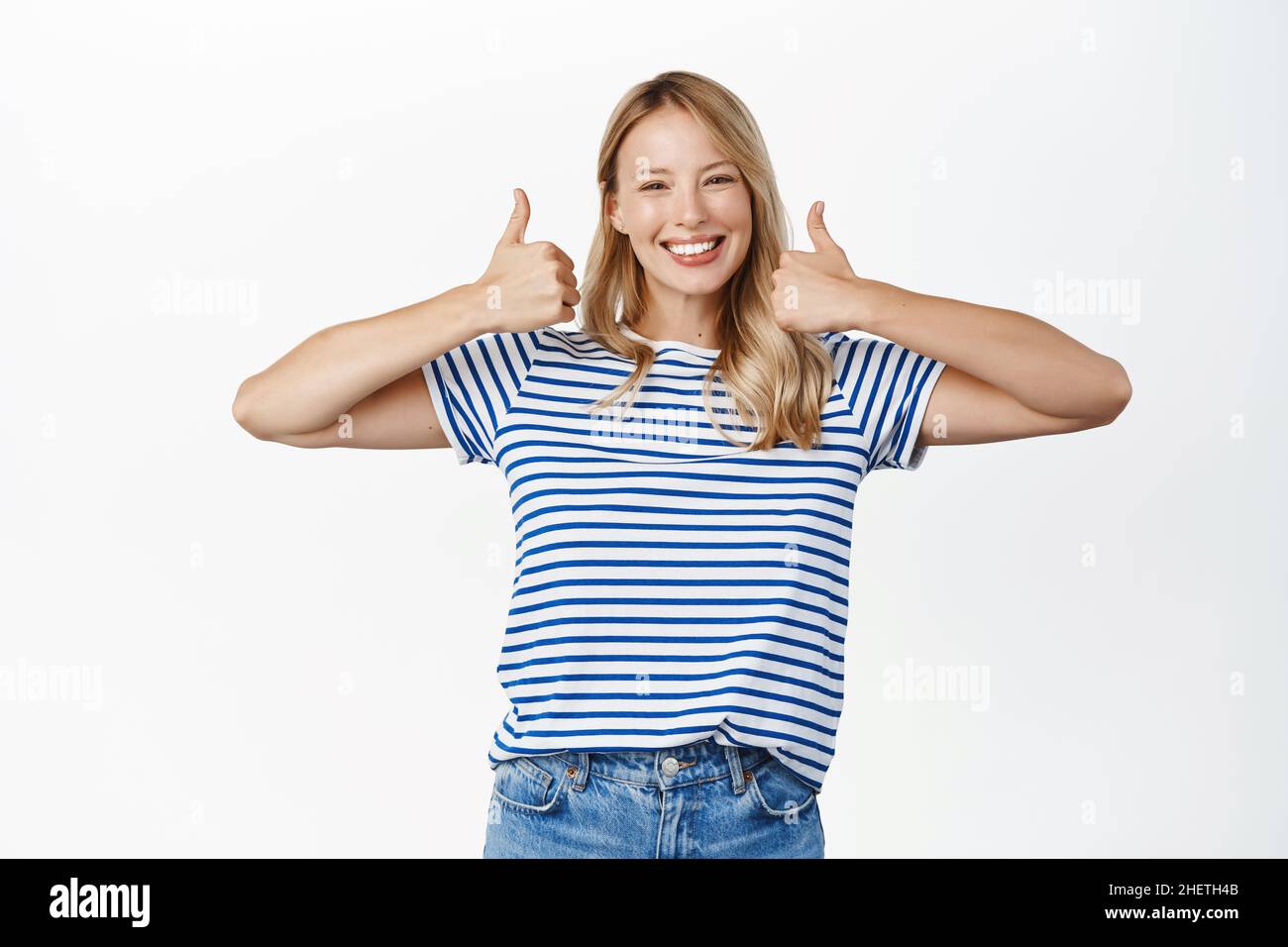 Very good, yes. Smiling happy woman praise excellent work, shows thumbs ...