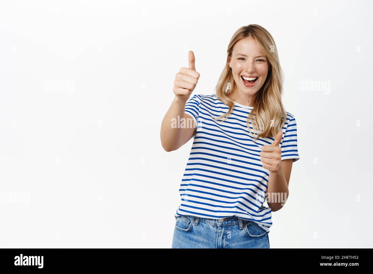 Very good, yes. Smiling happy woman praise excellent work, shows thumbs ...