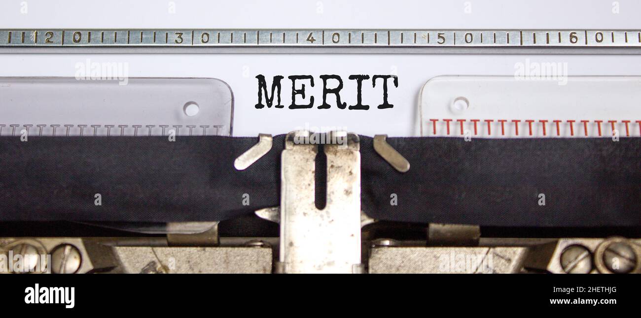 Merit symbol. The concept word merit typed on retro typewriter ...
