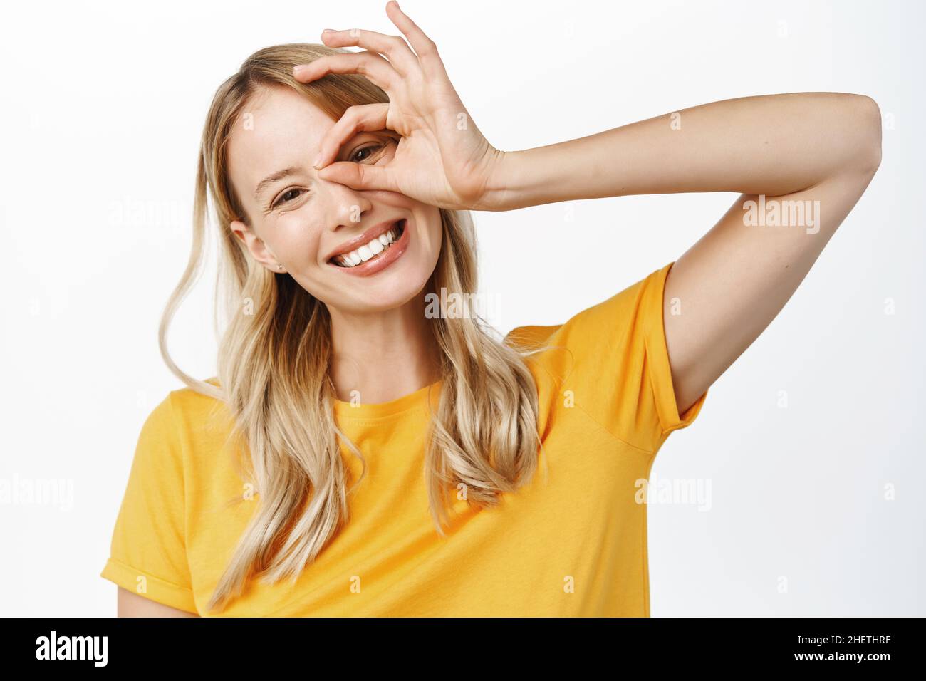 Face portrait of beautiful girl smiling, showing okay, ok, zero no ...