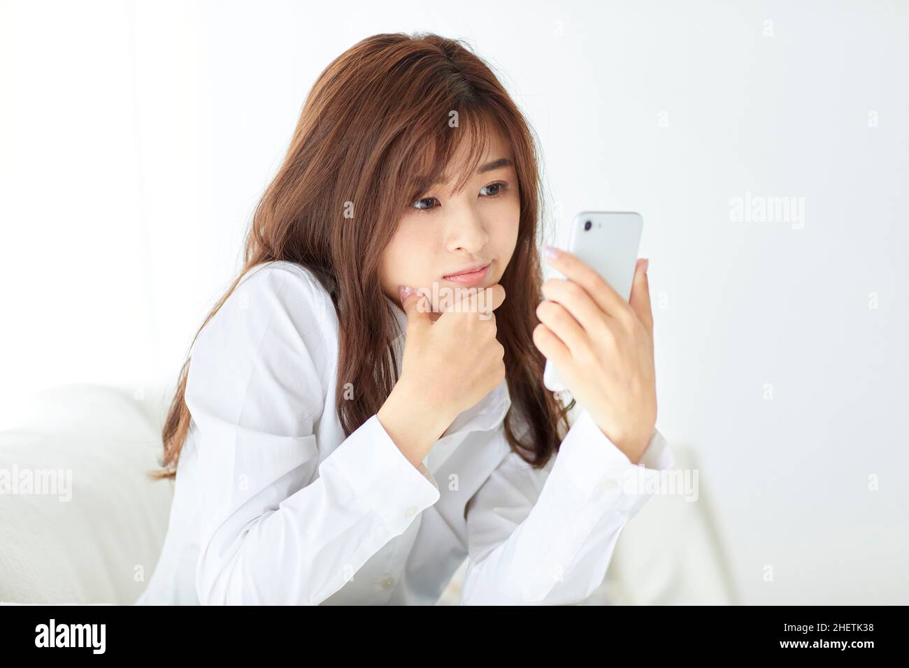 Japanese Woman Thinking Stock Photo - Alamy