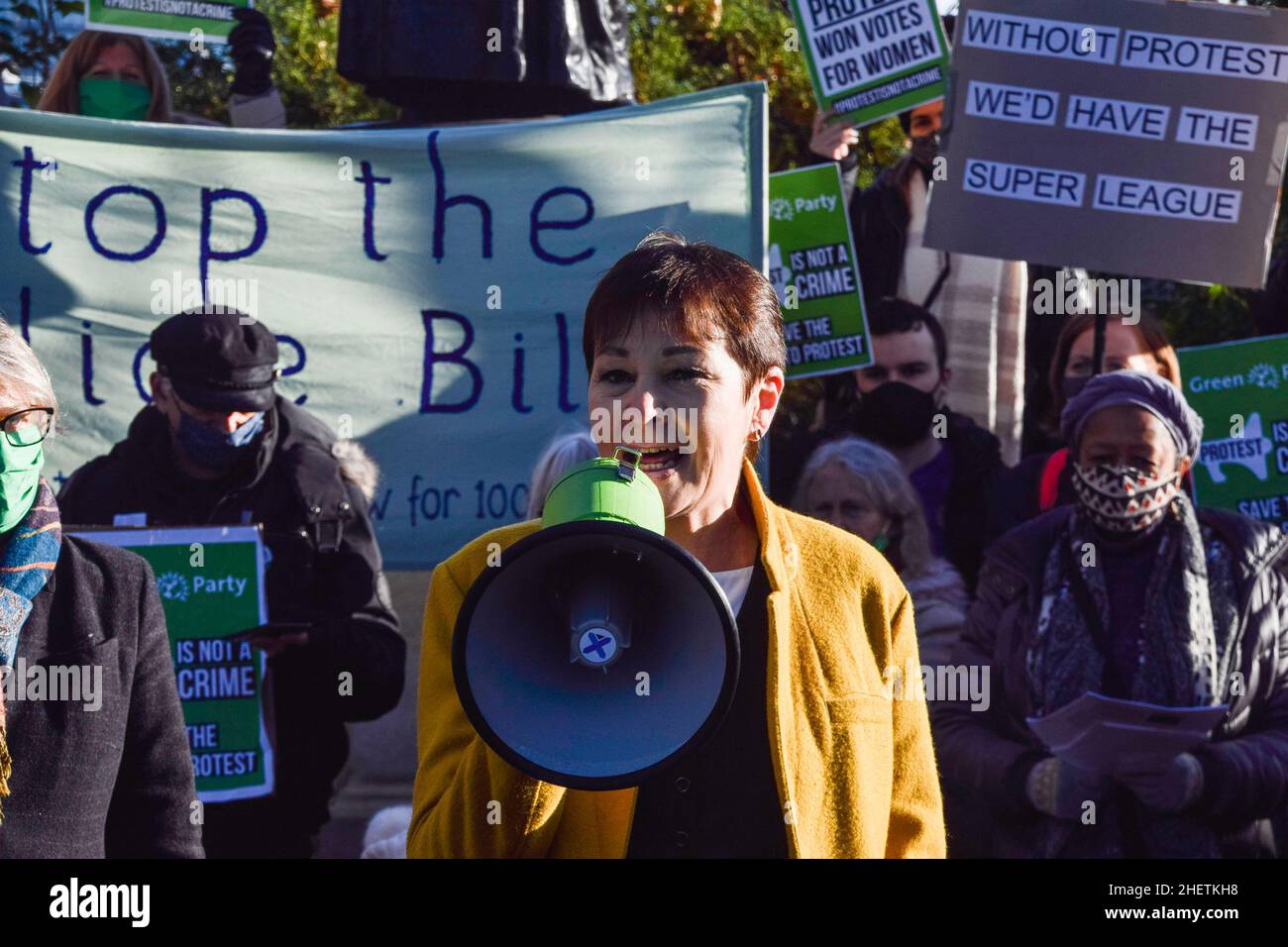 Green Party MP Caroline Lucas speaks to protesters through a megaphone ...