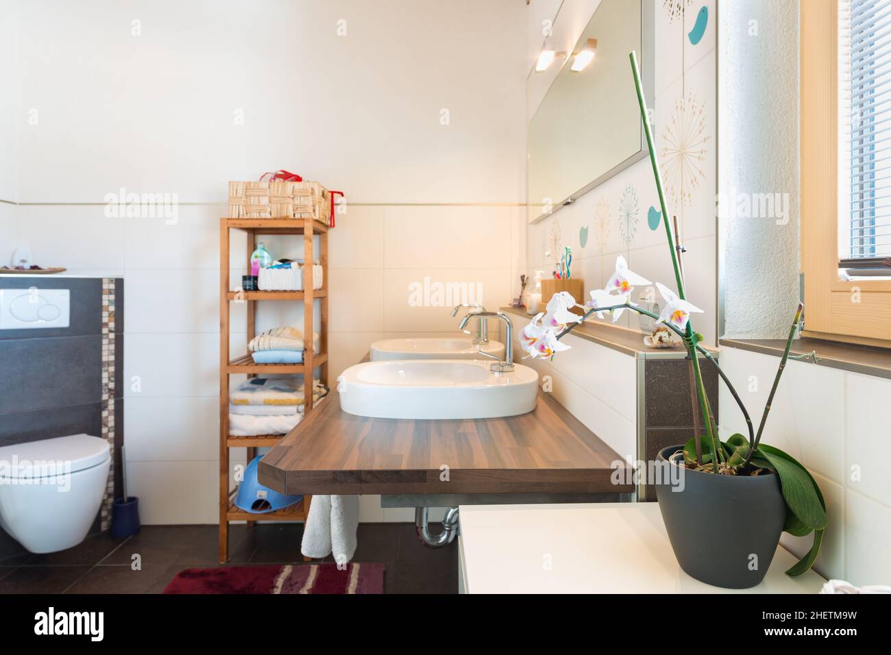 detail of basin on wooden board with decoration in bathroom Stock Photo ...