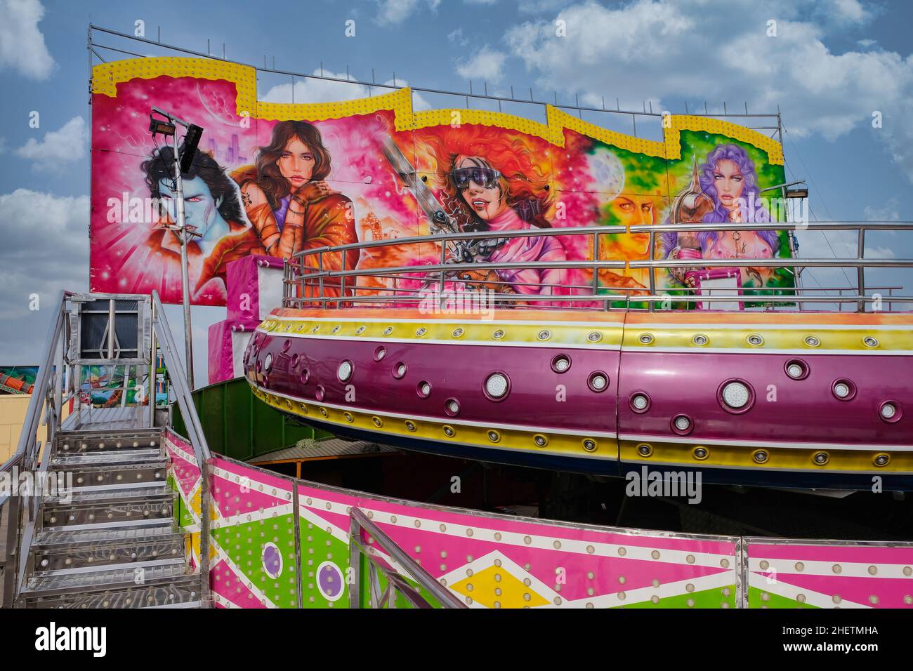 Funfair jumping attraction in Spain with vibrant colors Stock Photo - Alamy