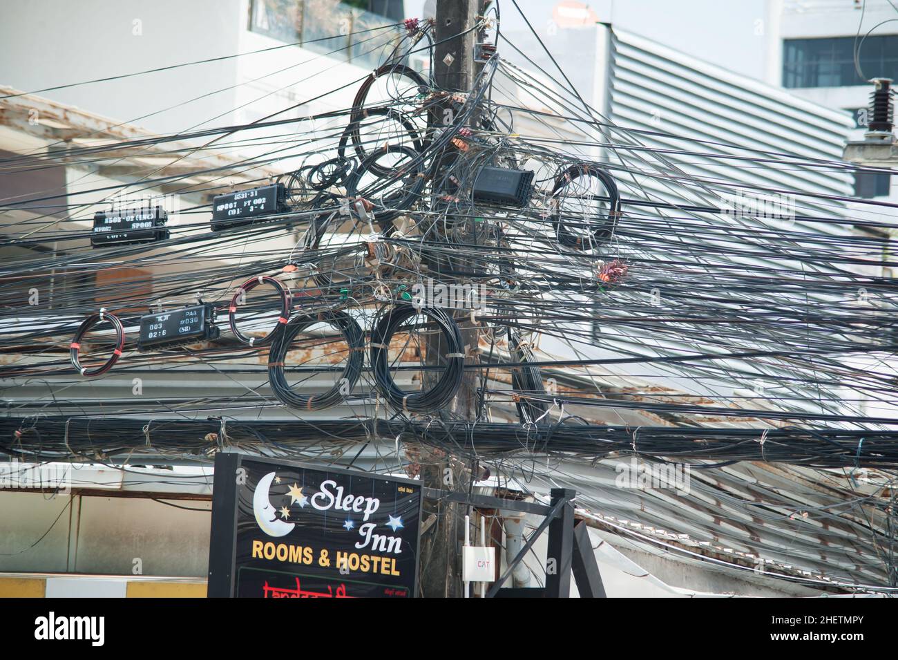 PHUKET, THAILAND - 13. MARCH 2018. Lamp post on tangle of electrical ...