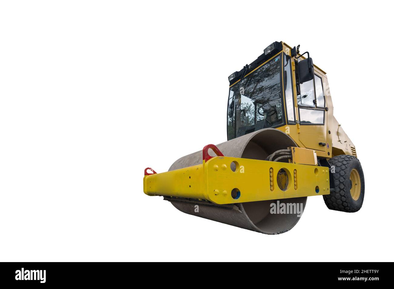 front view of huge isolated yellow compactor truck Stock Photo - Alamy