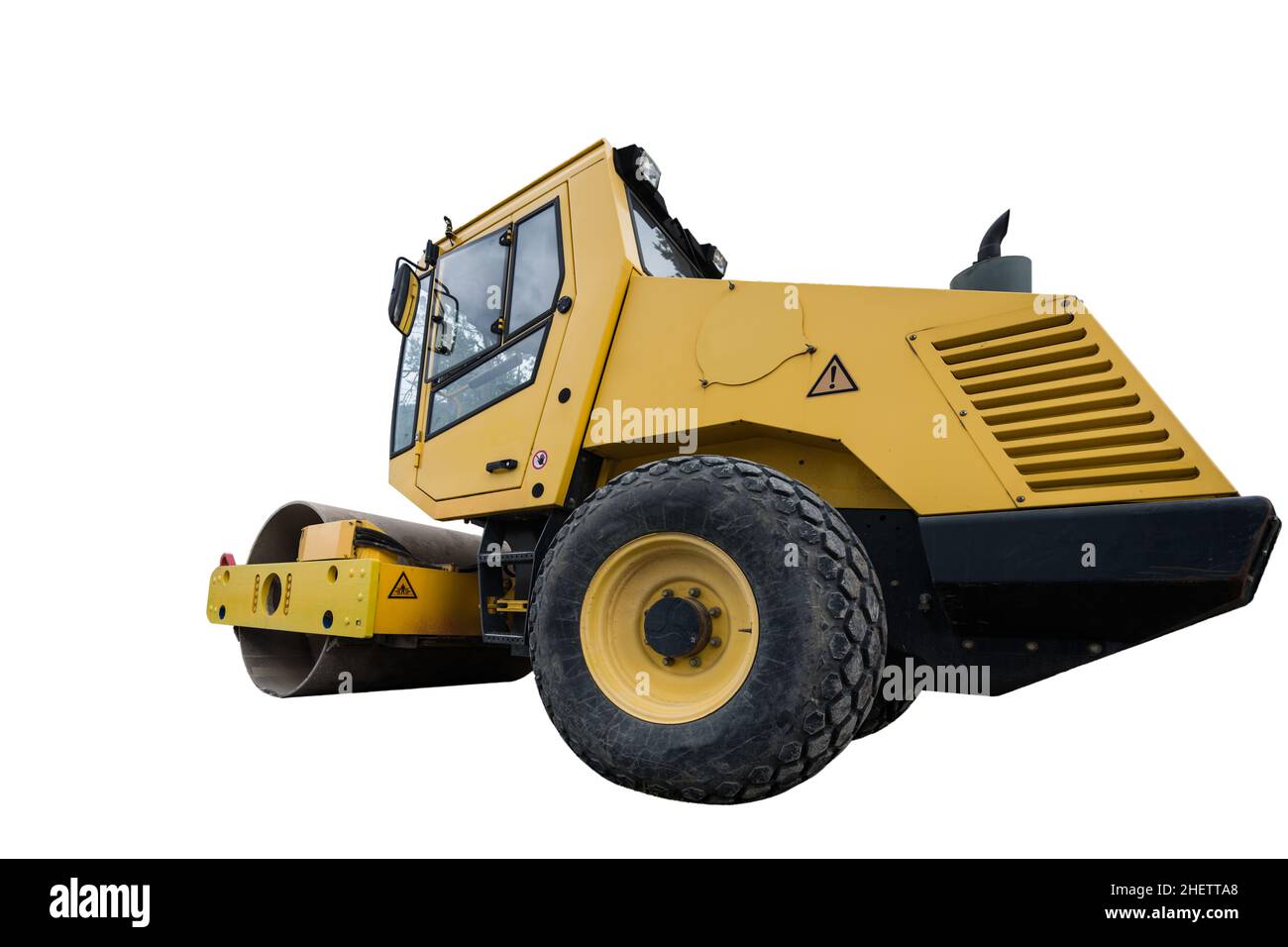 rear view of huge isolated yellow compactor truck Stock Photo - Alamy