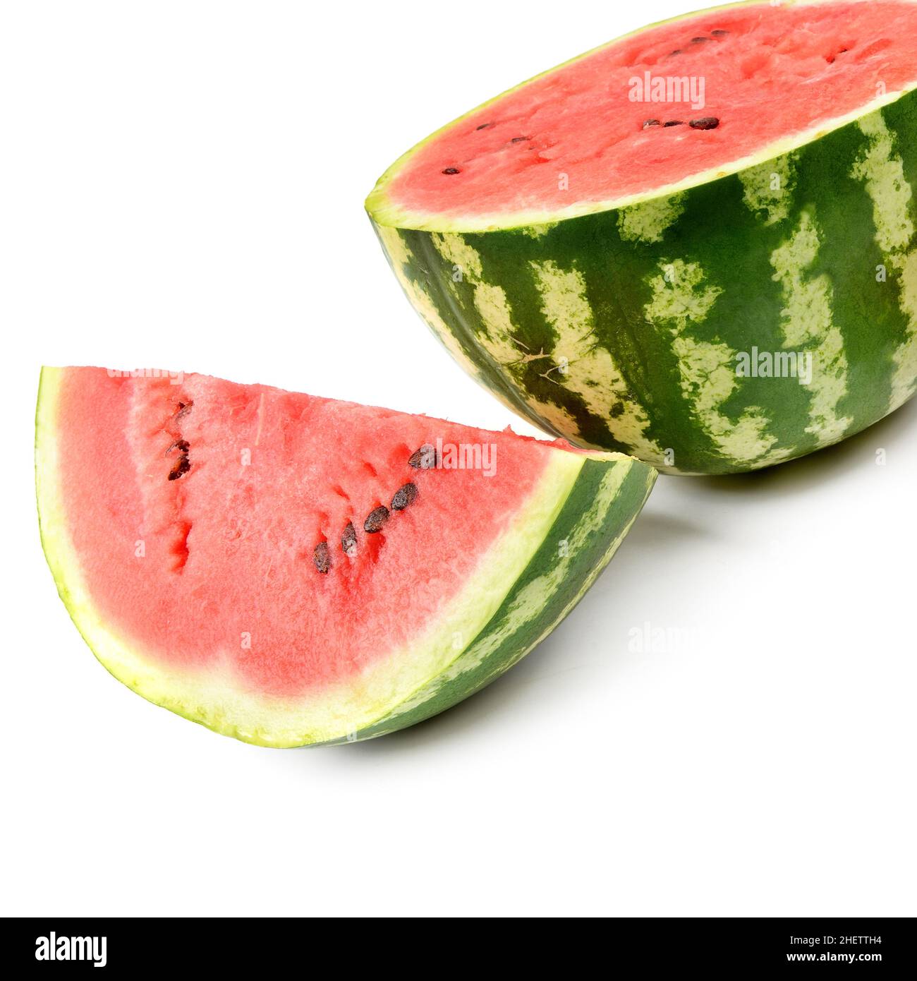 Ripe round watermelon and watermelons slices isolated on white ...