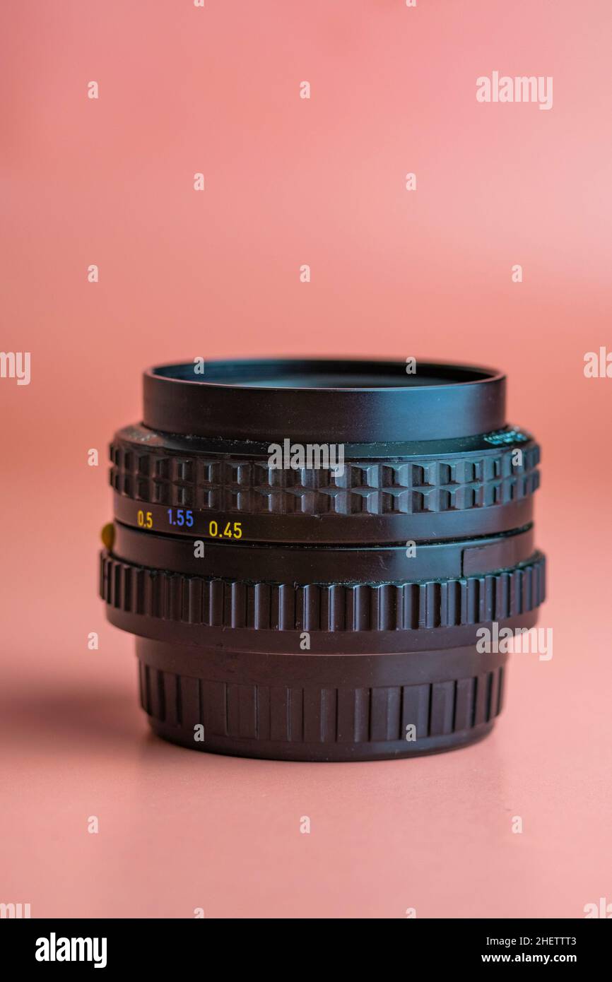 Photo Lens 55mm f2 on Orange Background Stock Photo - Alamy