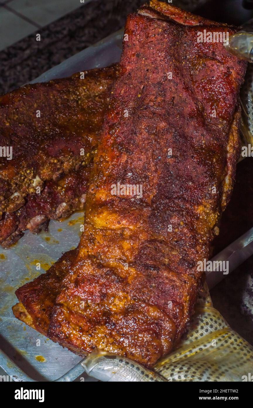 Spicy grilled summer barbecue cutlets served with an antique vintage ...