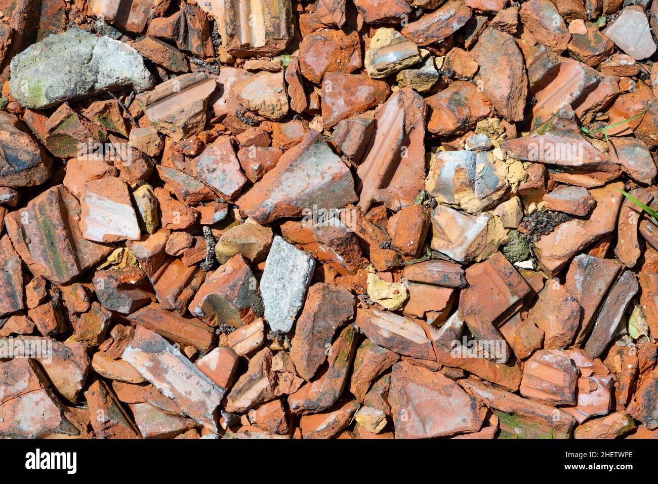 construction rubble of old red old tiles gives a harmonic background ...
