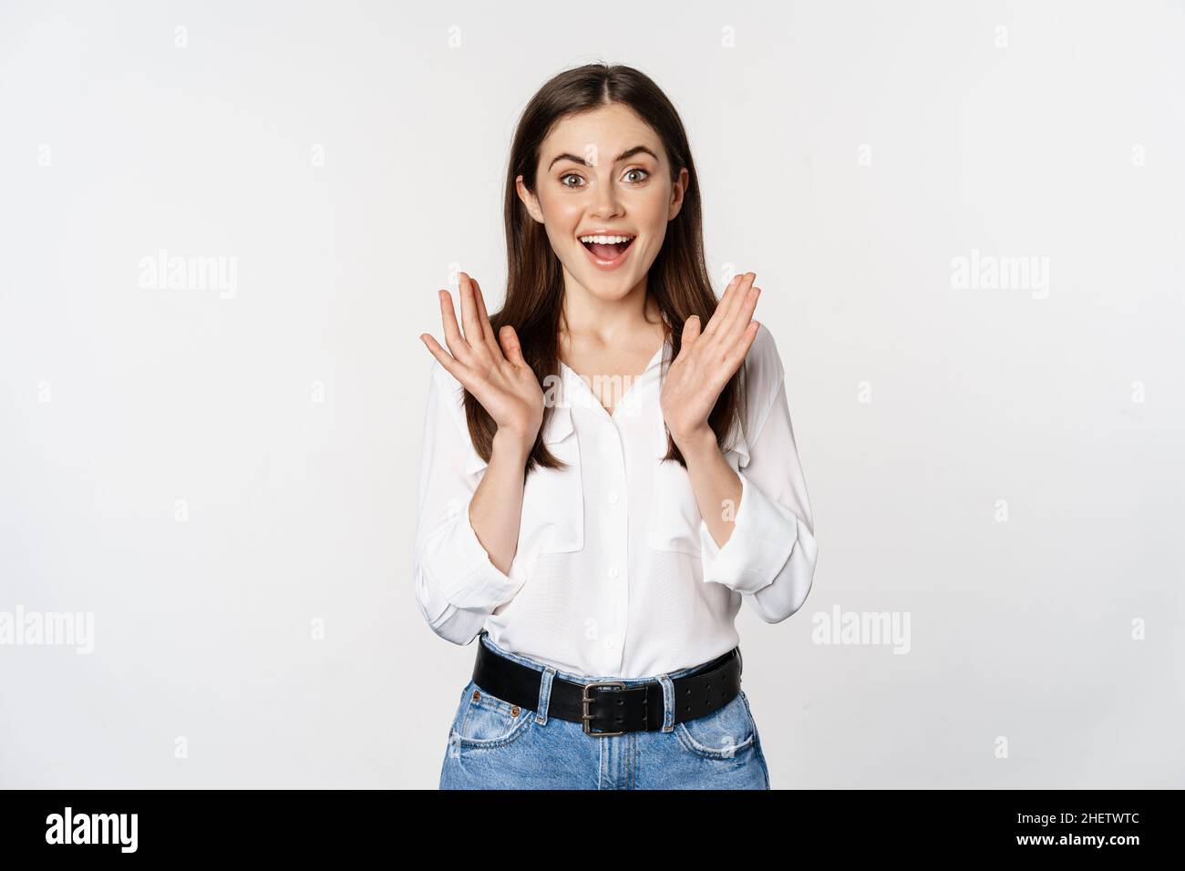 Enthusiastic laughing woman, smiling amused, clapping hands, applausing ...