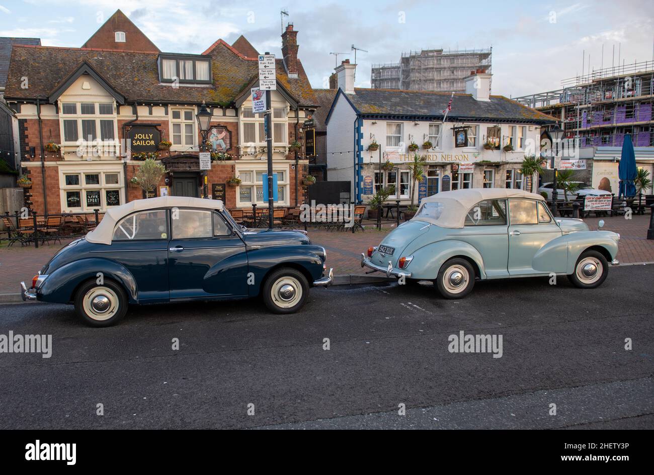 2 Morris Minor Classic cars on Poole quay Stock Photo - Alamy