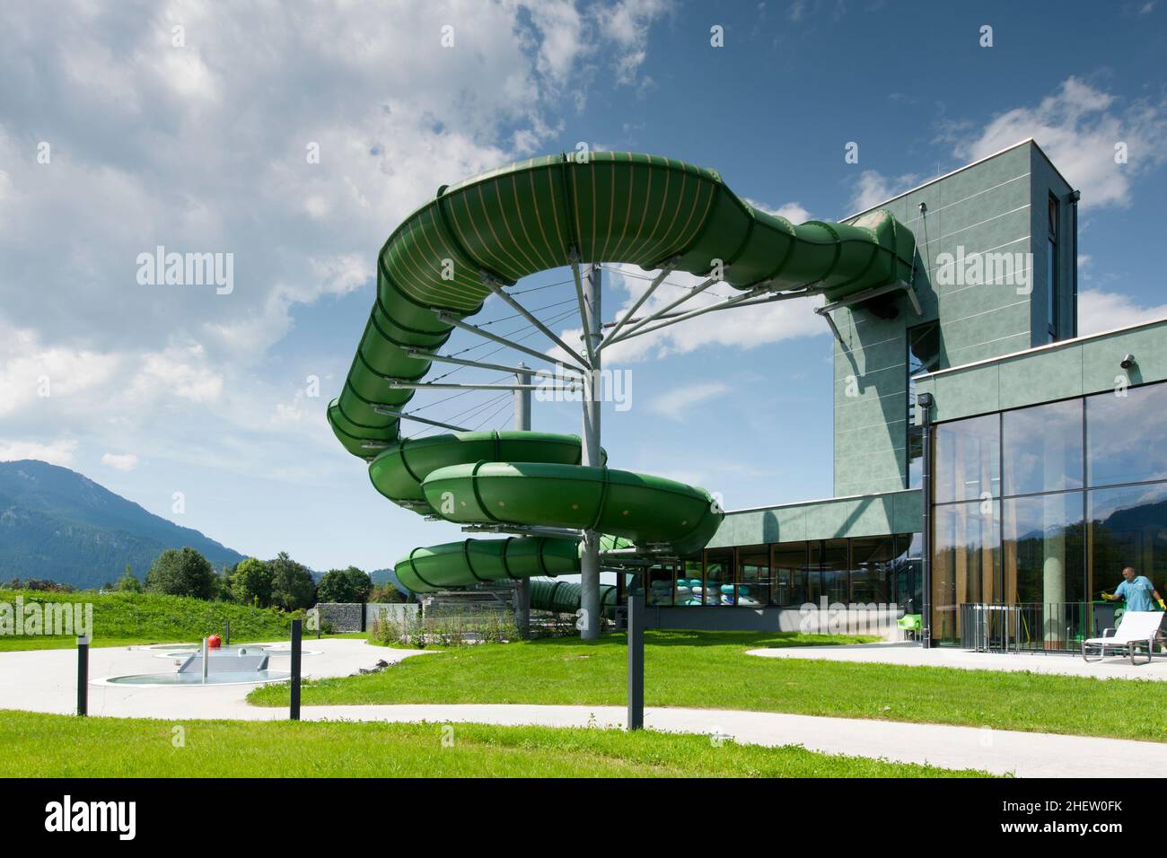 swim bath with outdoor pool and water slide at summer day Stock Photo ...