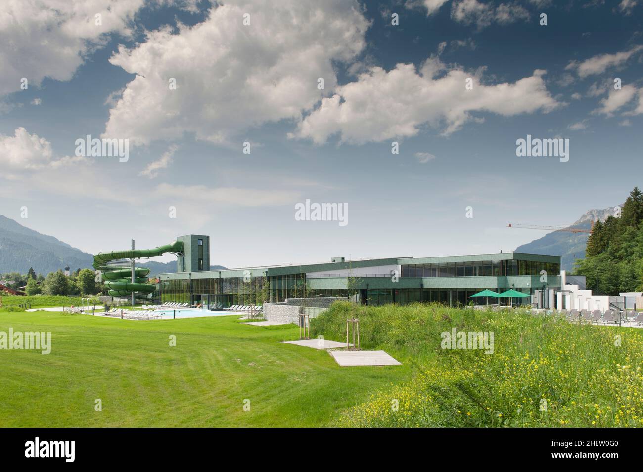 swim bath with outdoor pool and water slide at summer day Stock Photo ...