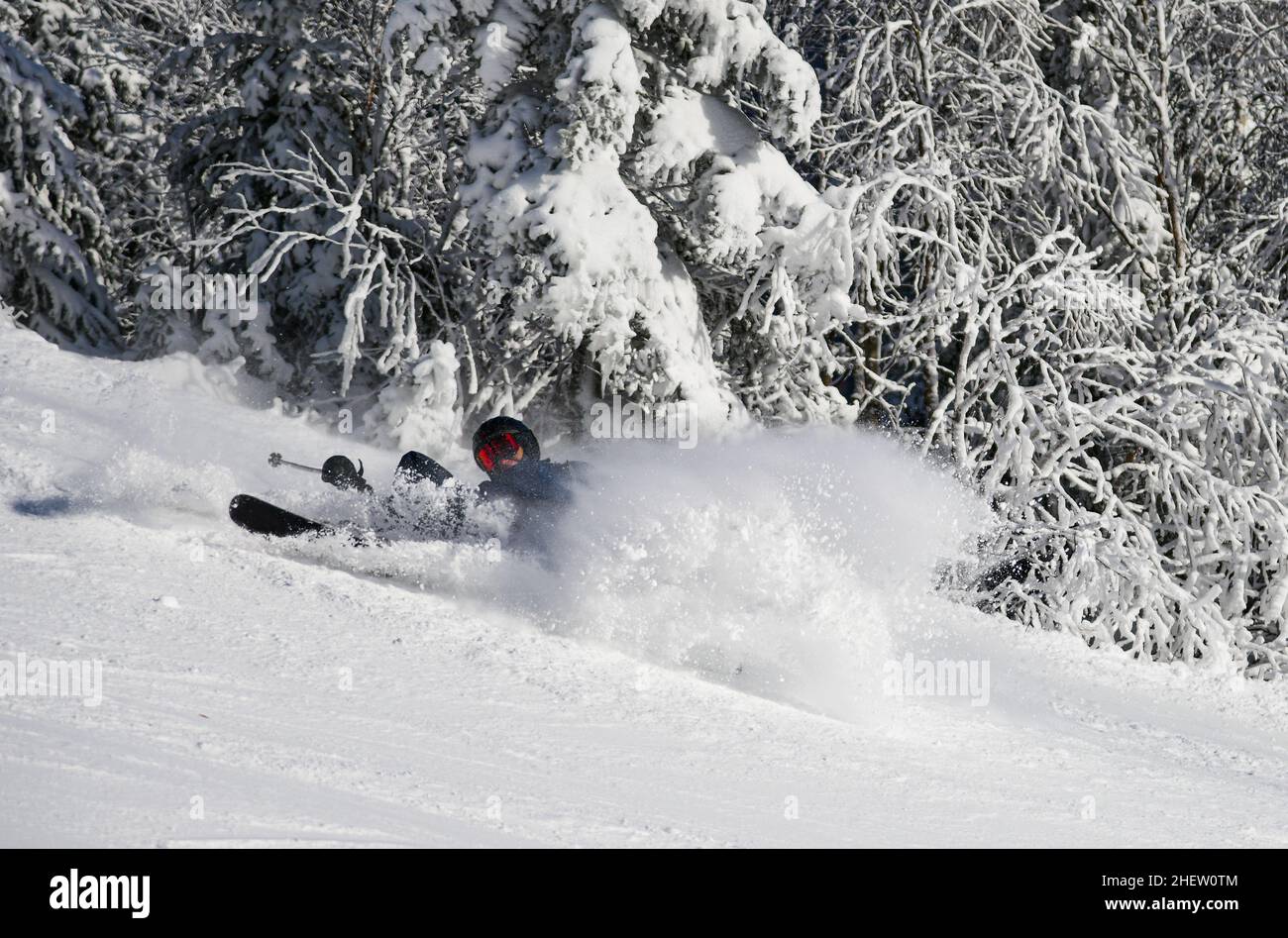 Falling skier on the mountainside at the ski resort Stock Photo - Alamy