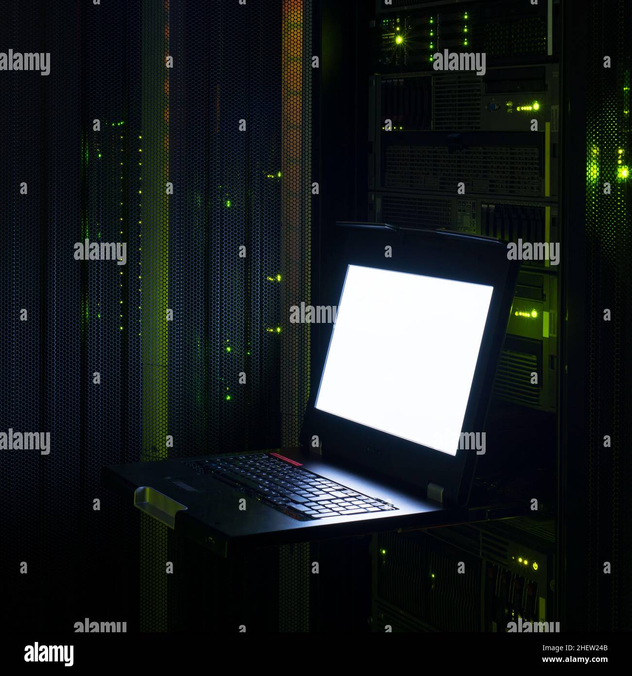 KVM keyboard, video, mouse switch in dark server computer room Stock ...