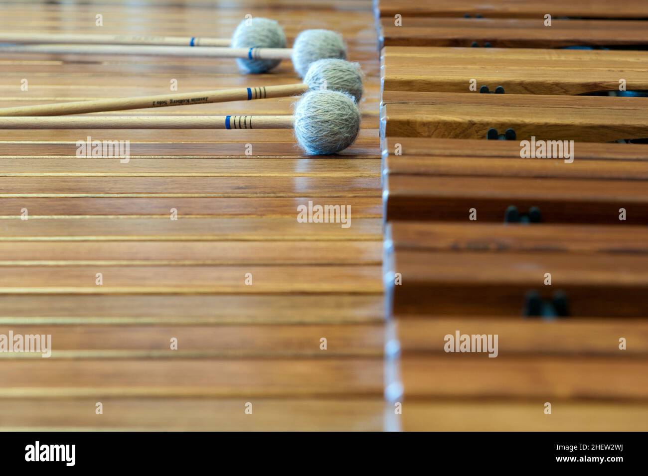 music wood xylophon with lying sticks on it Stock Photo - Alamy
