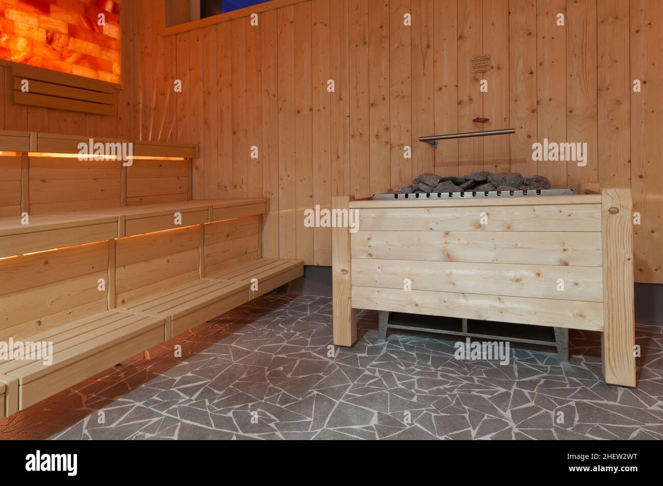 wooden steam sauna with benches and romantic light Stock Photo - Alamy