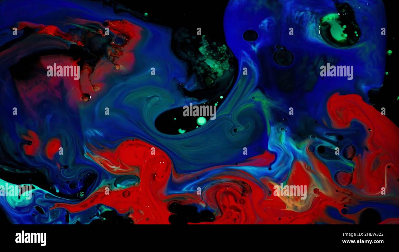 Abstract colorful paint reactions, psychedelic liquid light show, dye ...