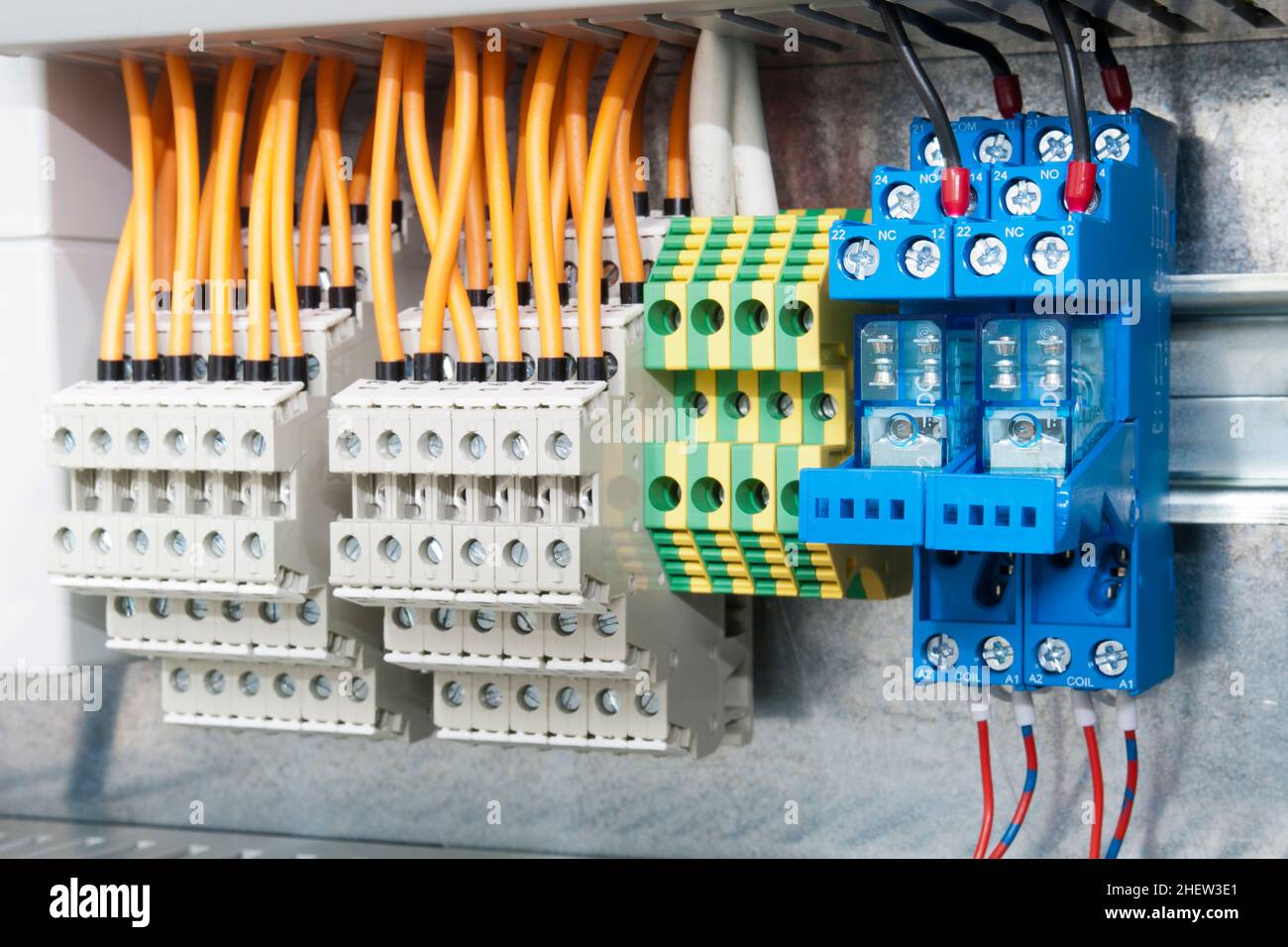 wired electrical board with terminals and cutout on metal bar Stock ...